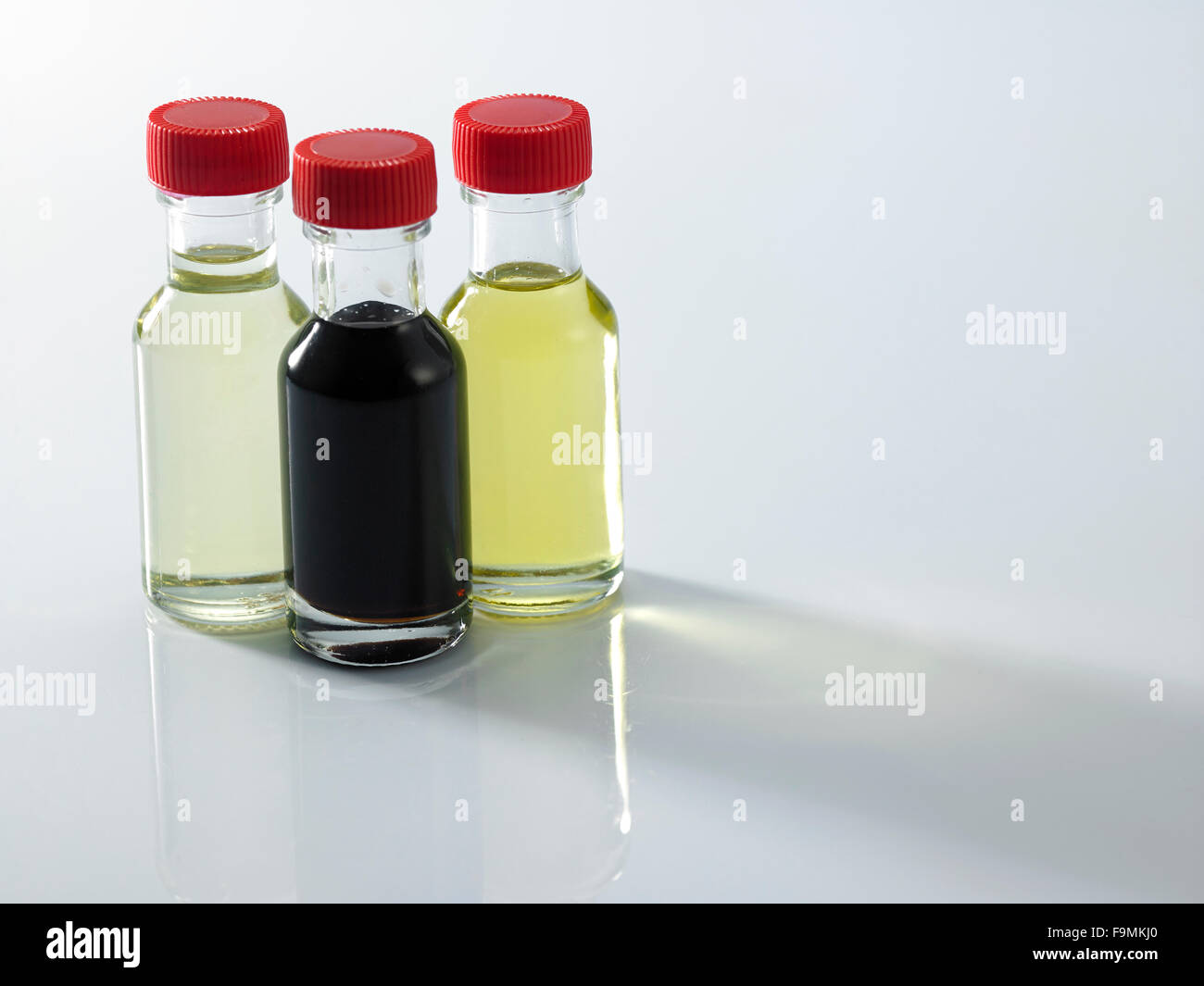 bottles of food coloring on the white background Stock Photo - Alamy