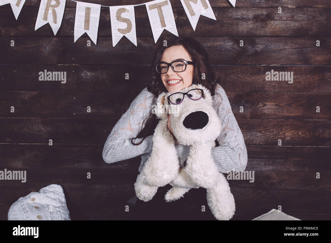 Cute girl hugging a cute toy Stock Photo - Alamy