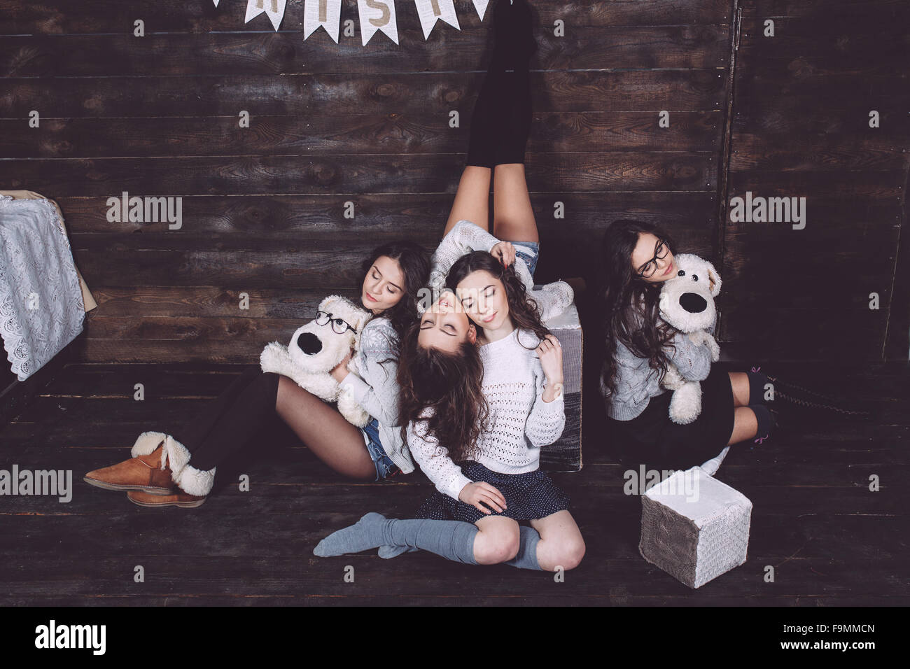 Four charming model posing Stock Photo - Alamy