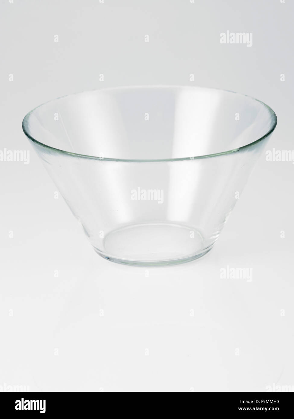 Close up view of an empty salad bowl isolated on a white background ...