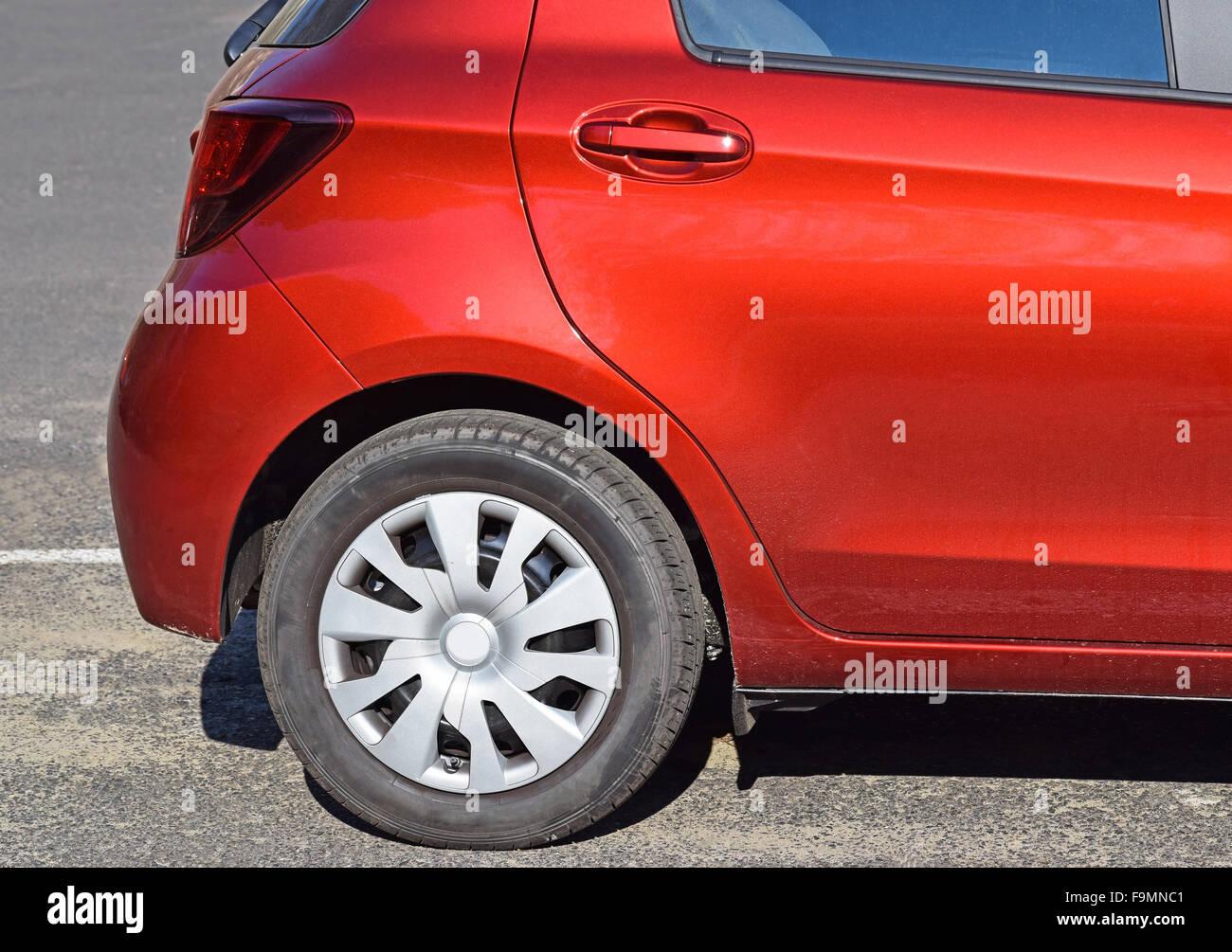 Tire of a red car Stock Photo - Alamy