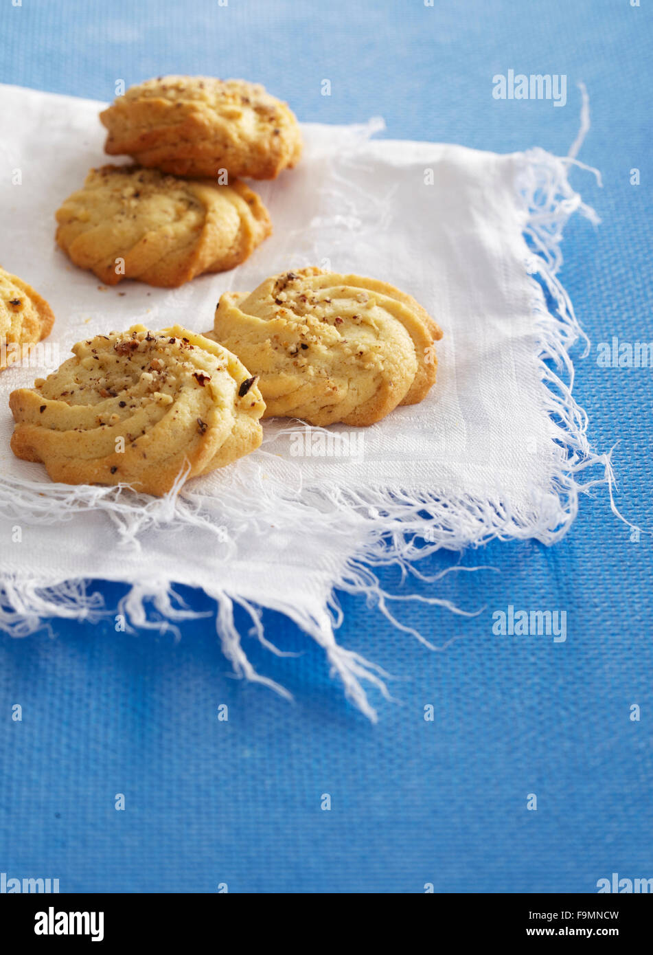 Piped hazelnut cookies Stock Photo - Alamy