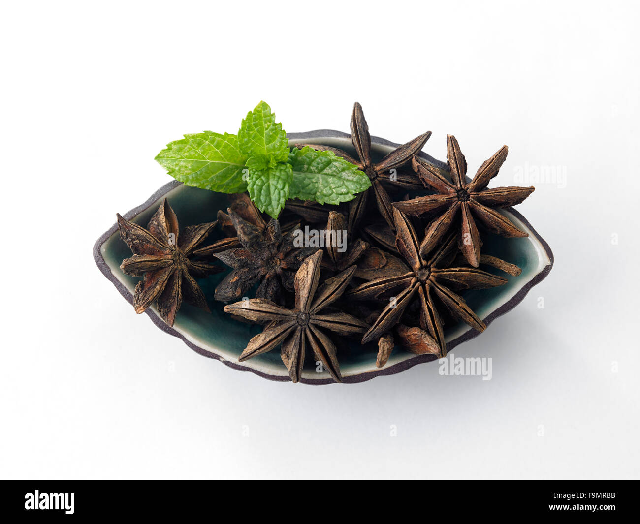 Anise and mint isolated on white background Stock Photo - Alamy
