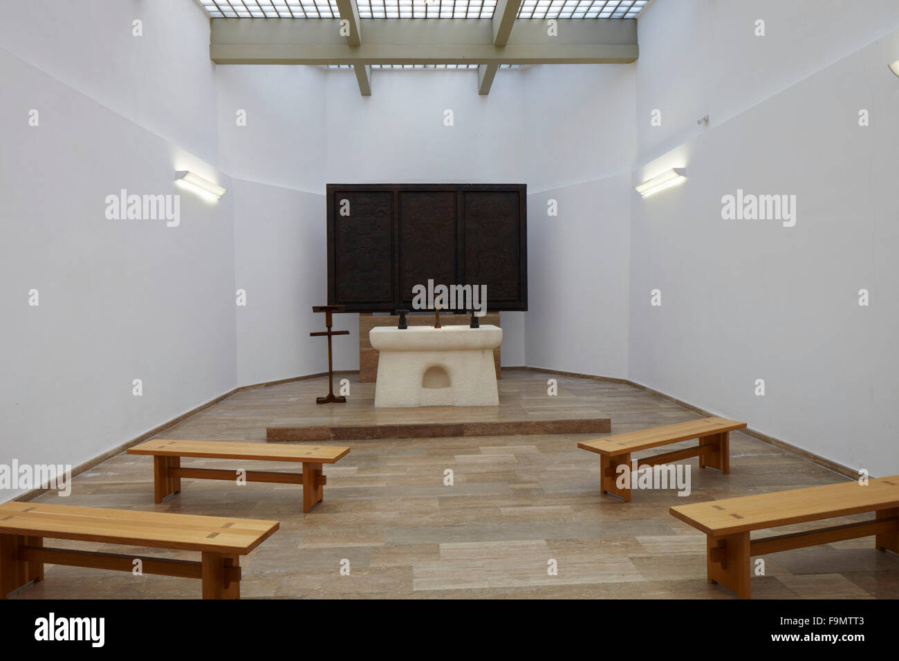 Altar and triptych by artist Rudolf Kedl. The simple white painted ...