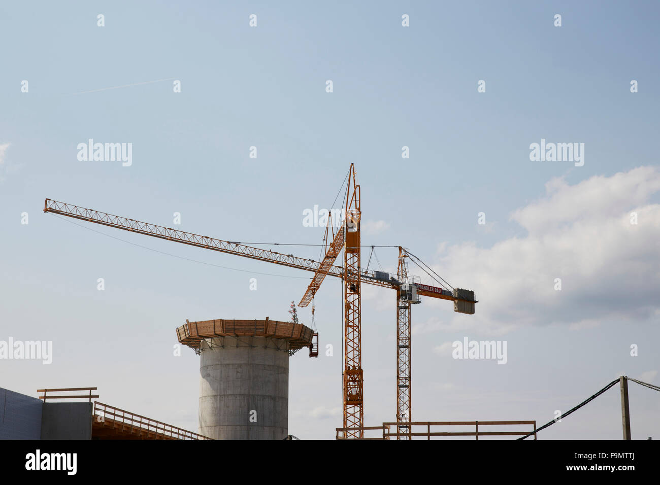 Building cranes at construction site. Top view of the cranes Stock ...