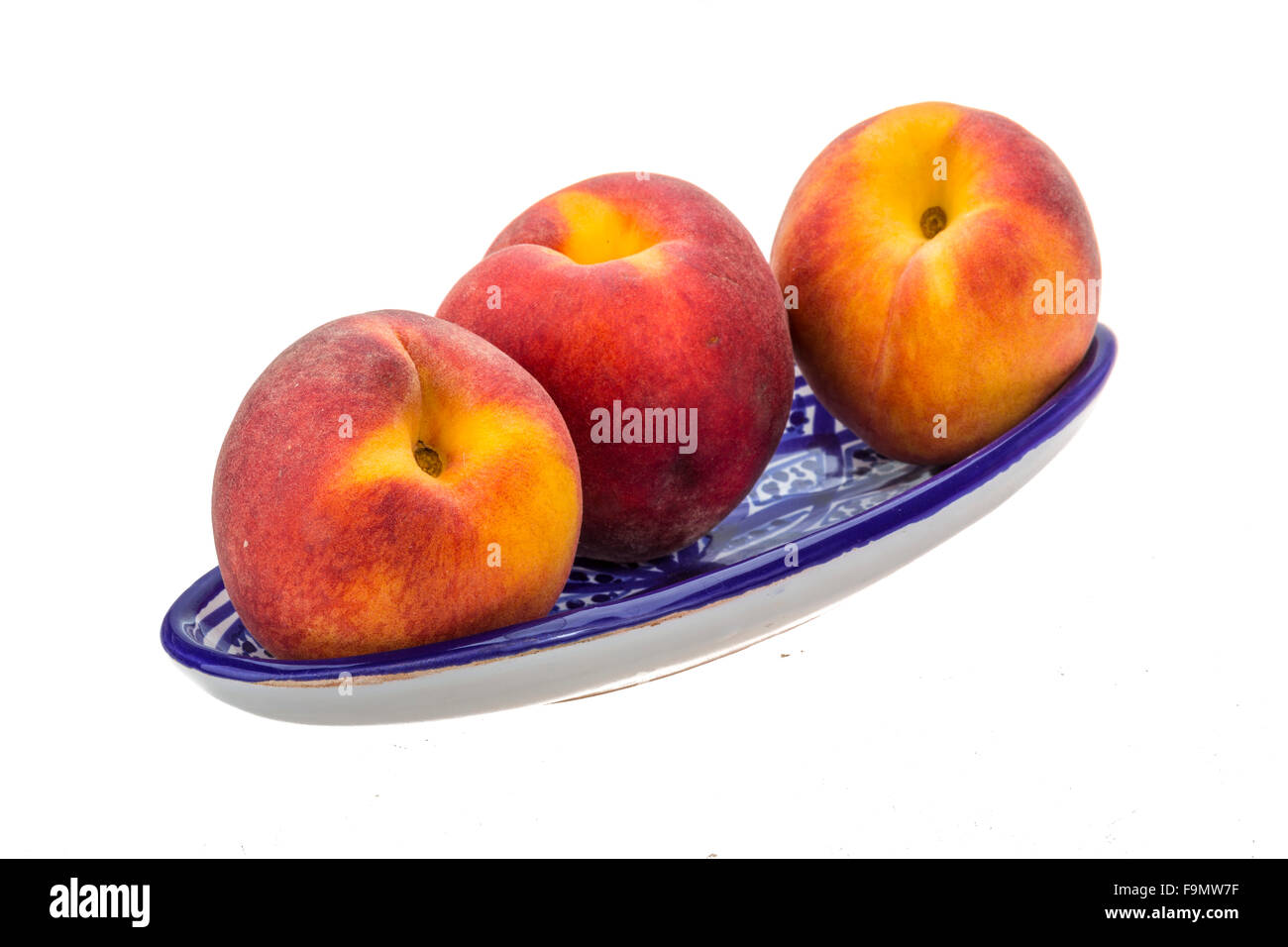 Bright ripe peaches isolated Stock Photo - Alamy