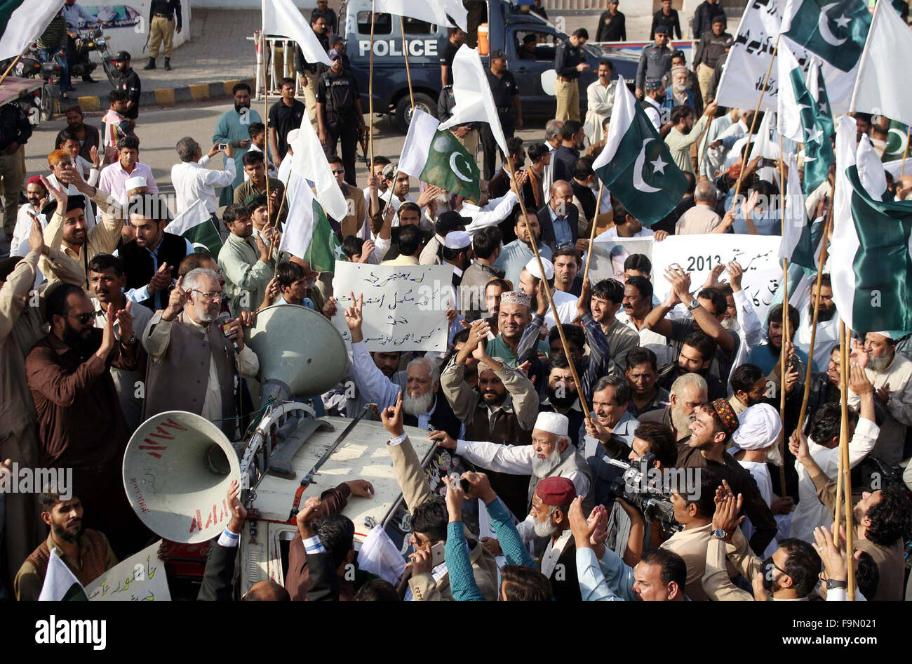 Members of All Karachi Tajir Ittehad (AKTI) chant slogans against the ...