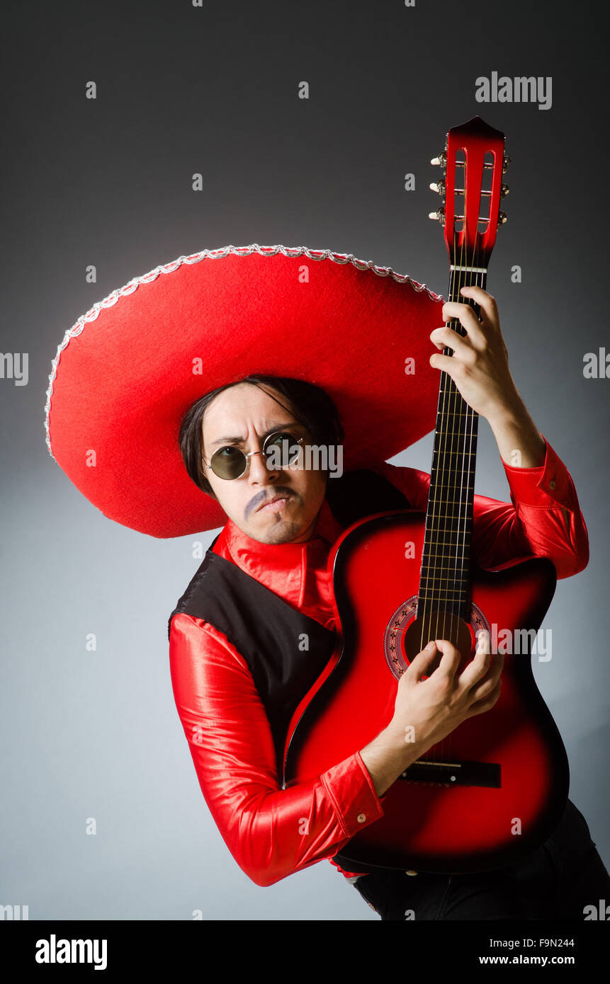 Mexican guitar player in red Stock Photo - Alamy