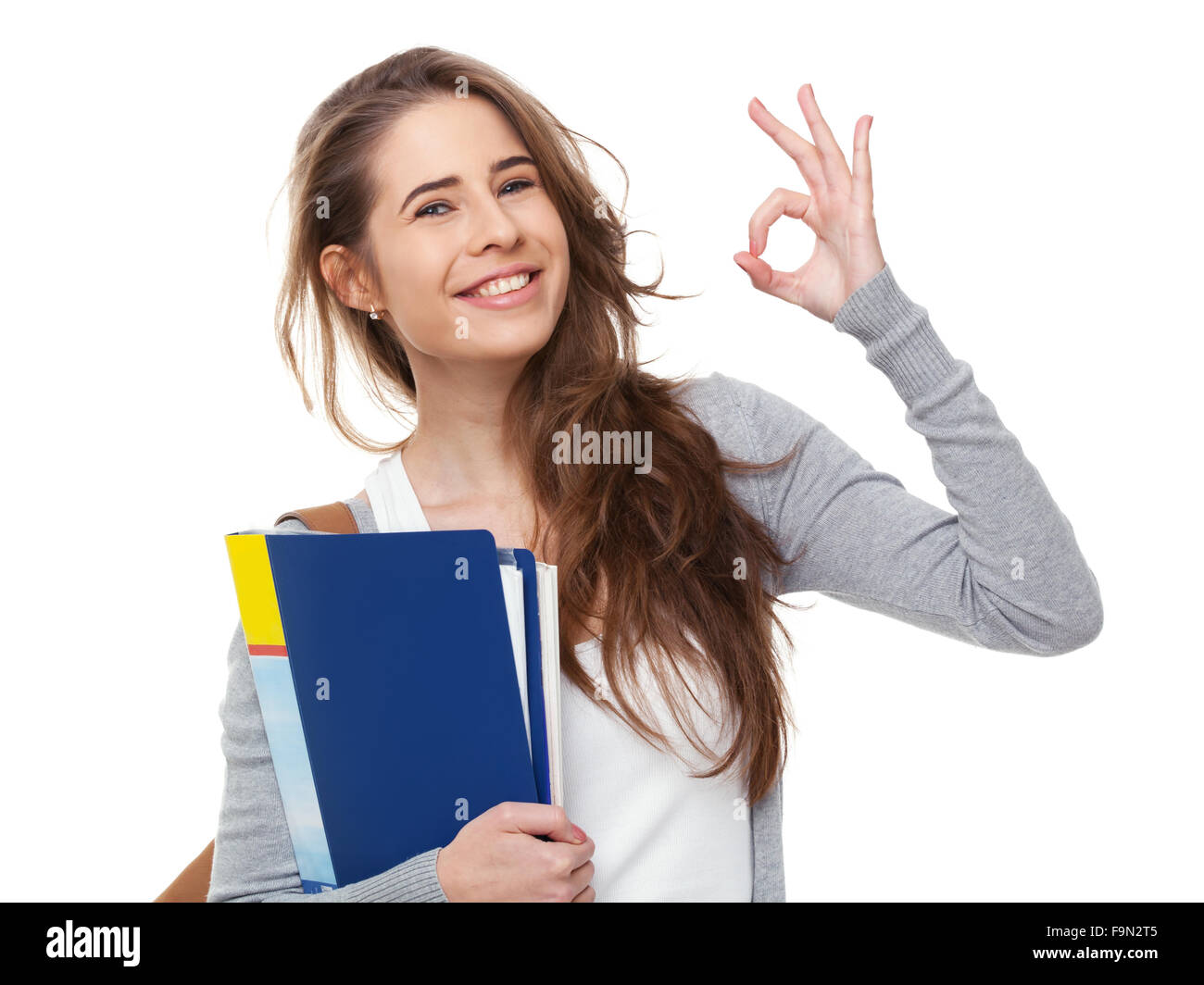 Young happy student showing ok sign isolated on white background Stock ...