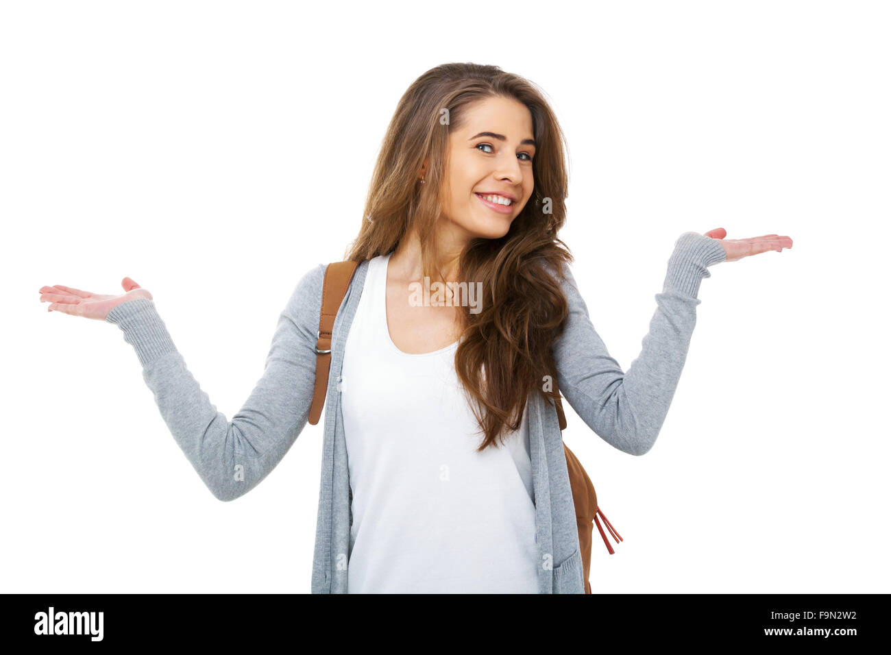Young happy student shrugging in doubt - isolated on white Stock Photo ...