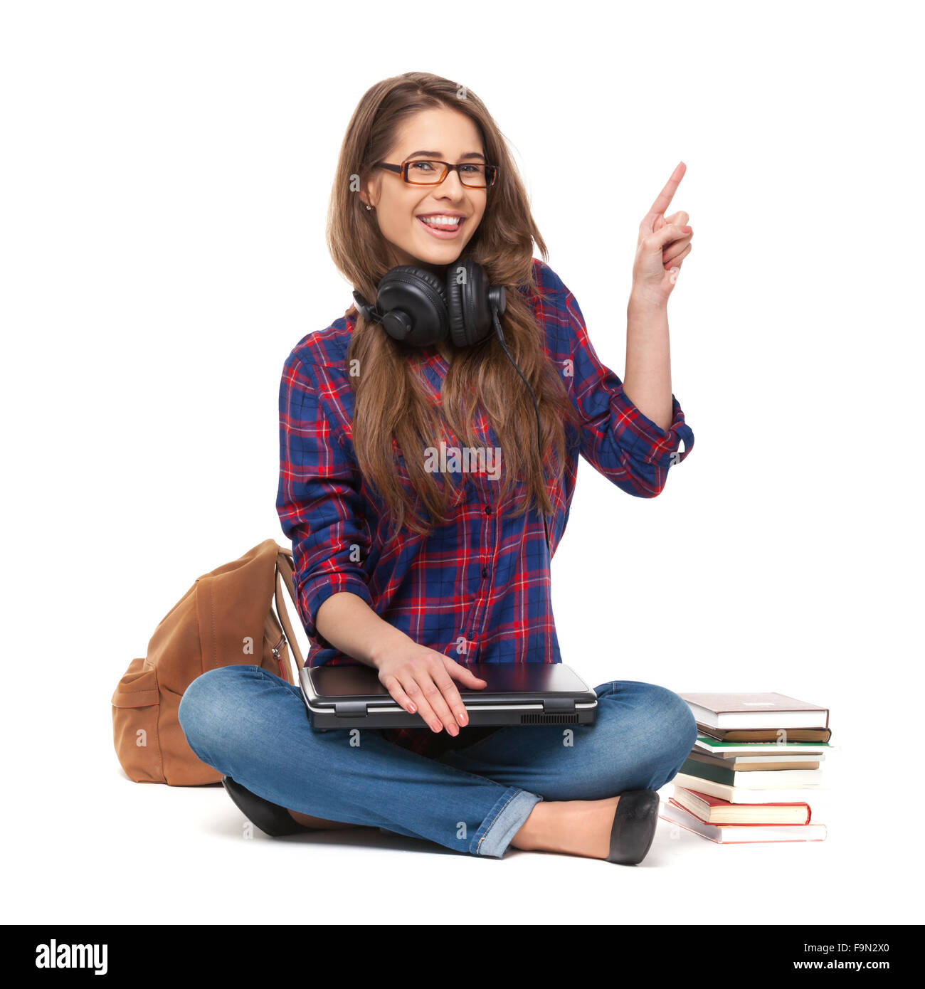 Young beautiful happy student posing on white background Stock Photo ...