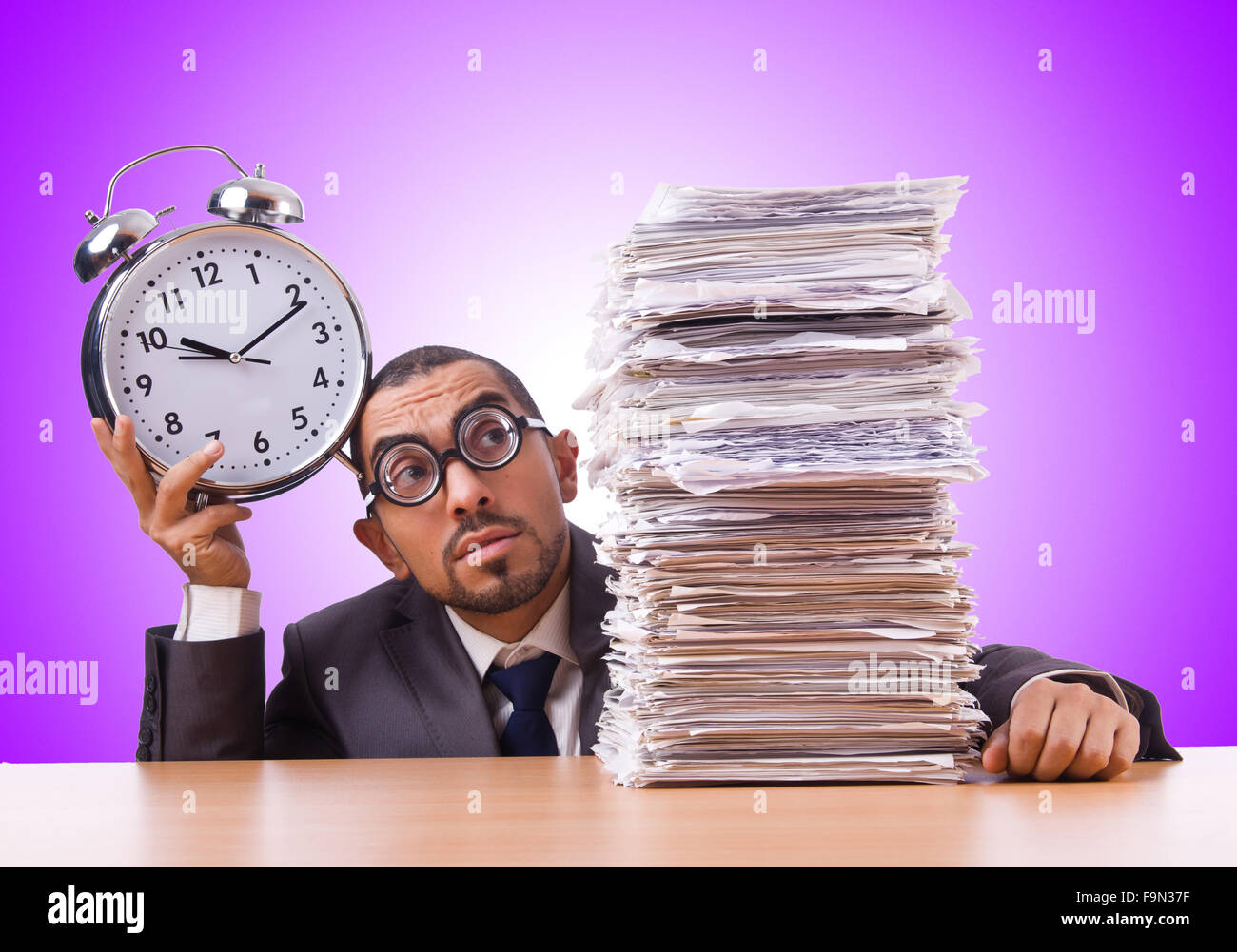 Woman businesswoman with giant alarm clock Stock Photo - Alamy Woman businesswoman with giant alarm clock Stock Photo - Alamy