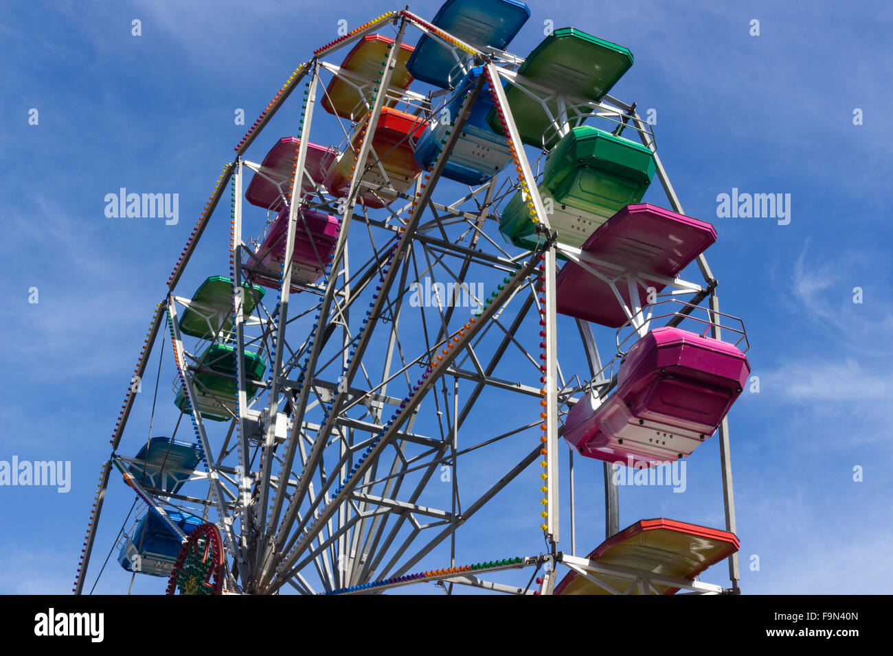 A colourful ferris wheel. Front view Stock Photo - Alamy