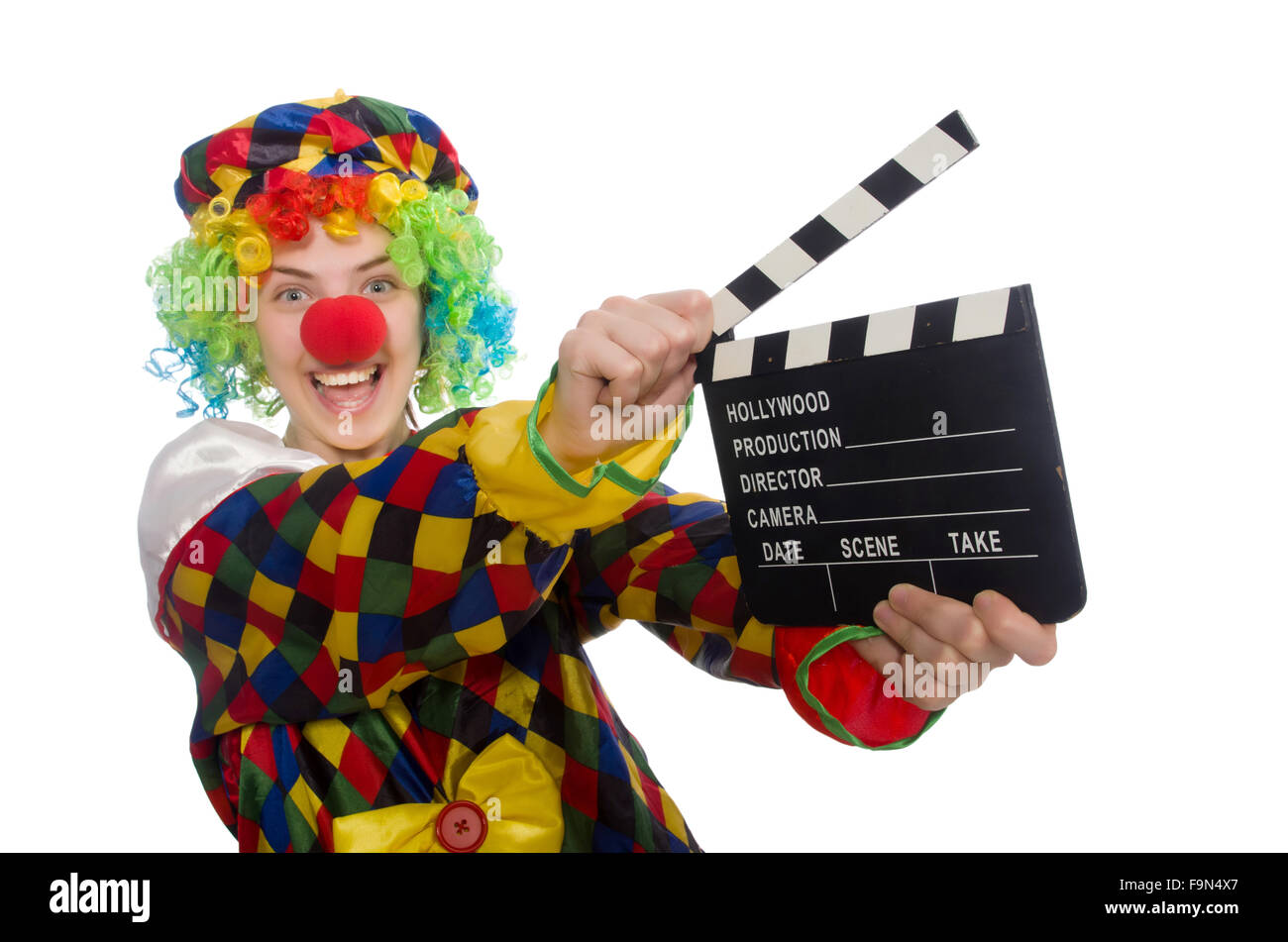 Clown with movie clapper isolated on white Stock Photo - Alamy