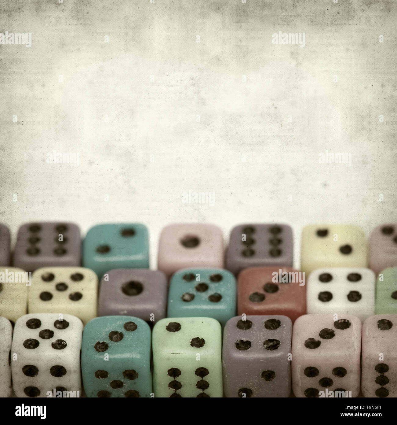 textured old paper background with many small dice Stock Photo - Alamy