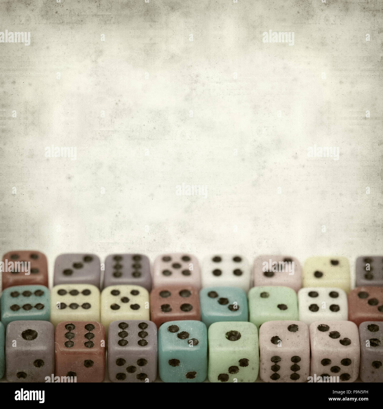 textured old paper background with many small dice Stock Photo - Alamy