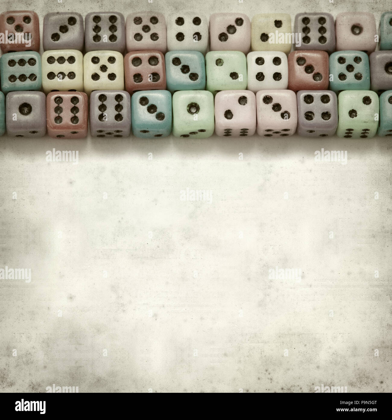 textured old paper background with many small dice Stock Photo - Alamy