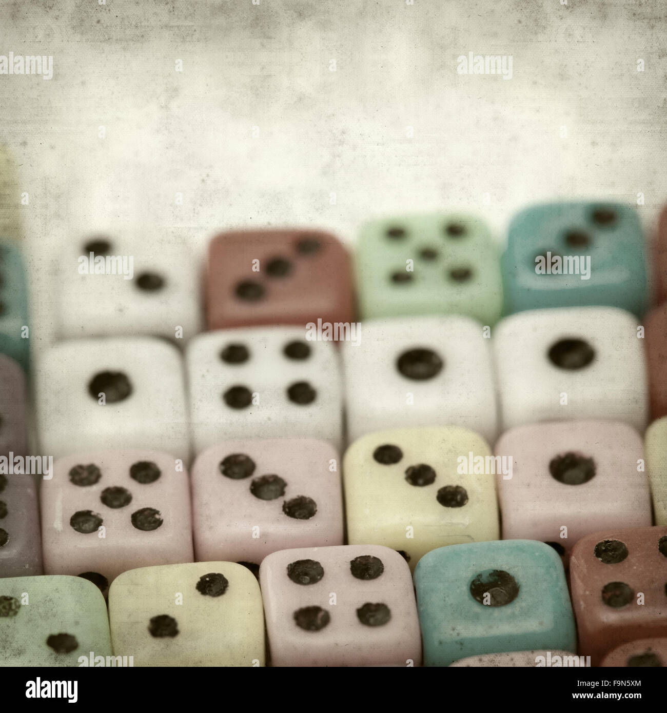 textured old paper background with many small dice Stock Photo - Alamy