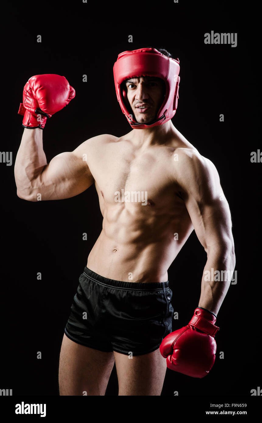 Muscular man in boxing concept Stock Photo - Alamy