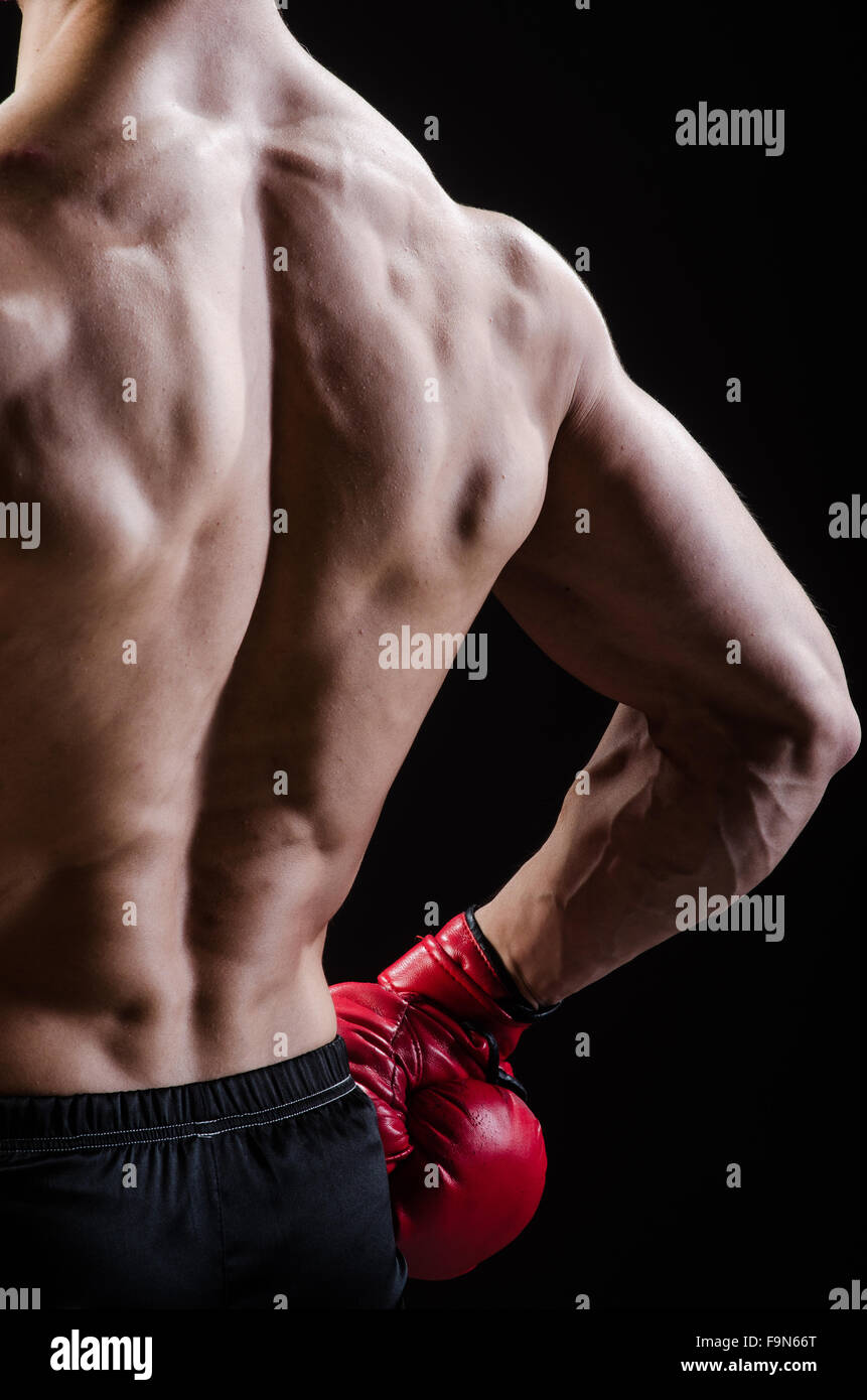 Muscular man in boxing concept Stock Photo - Alamy