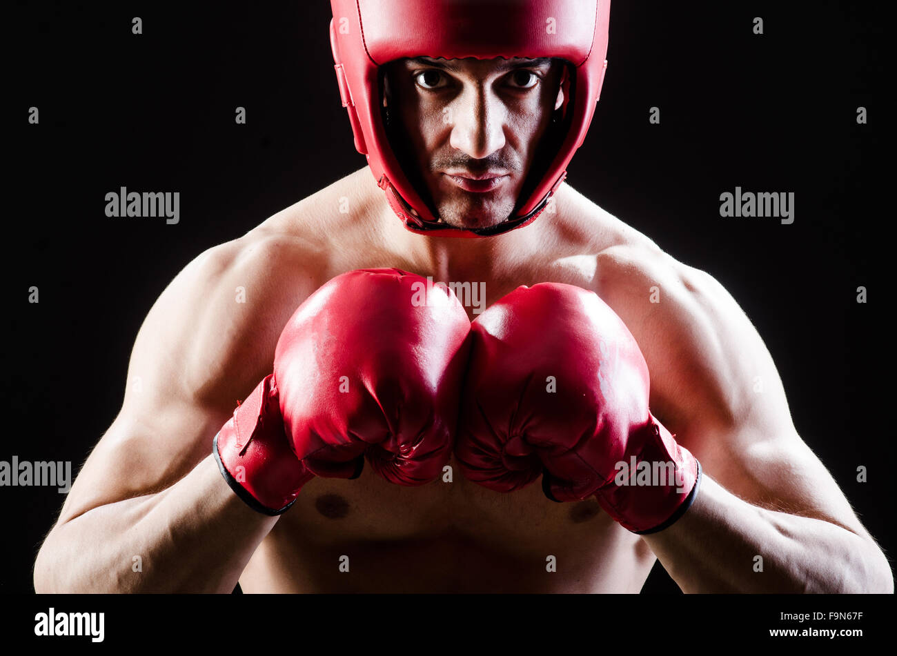 Muscular man in boxing concept Stock Photo - Alamy