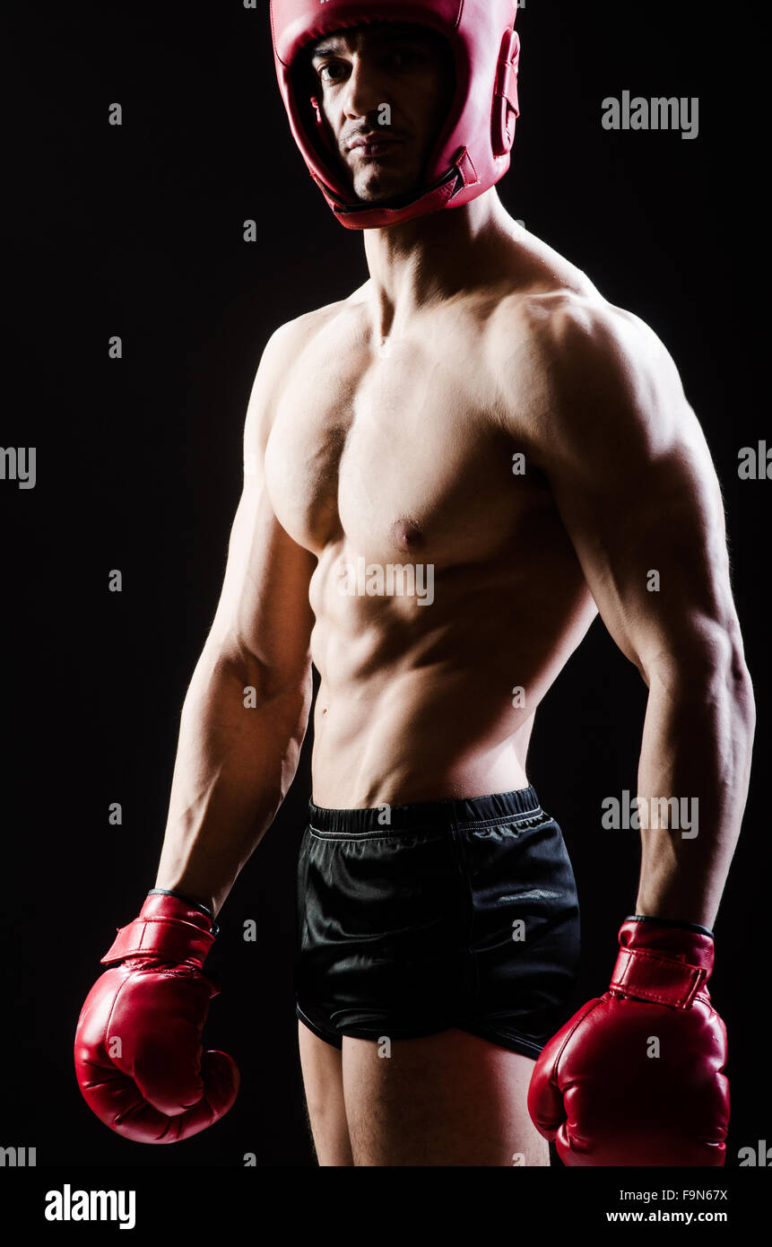 Muscular man in boxing concept Stock Photo - Alamy
