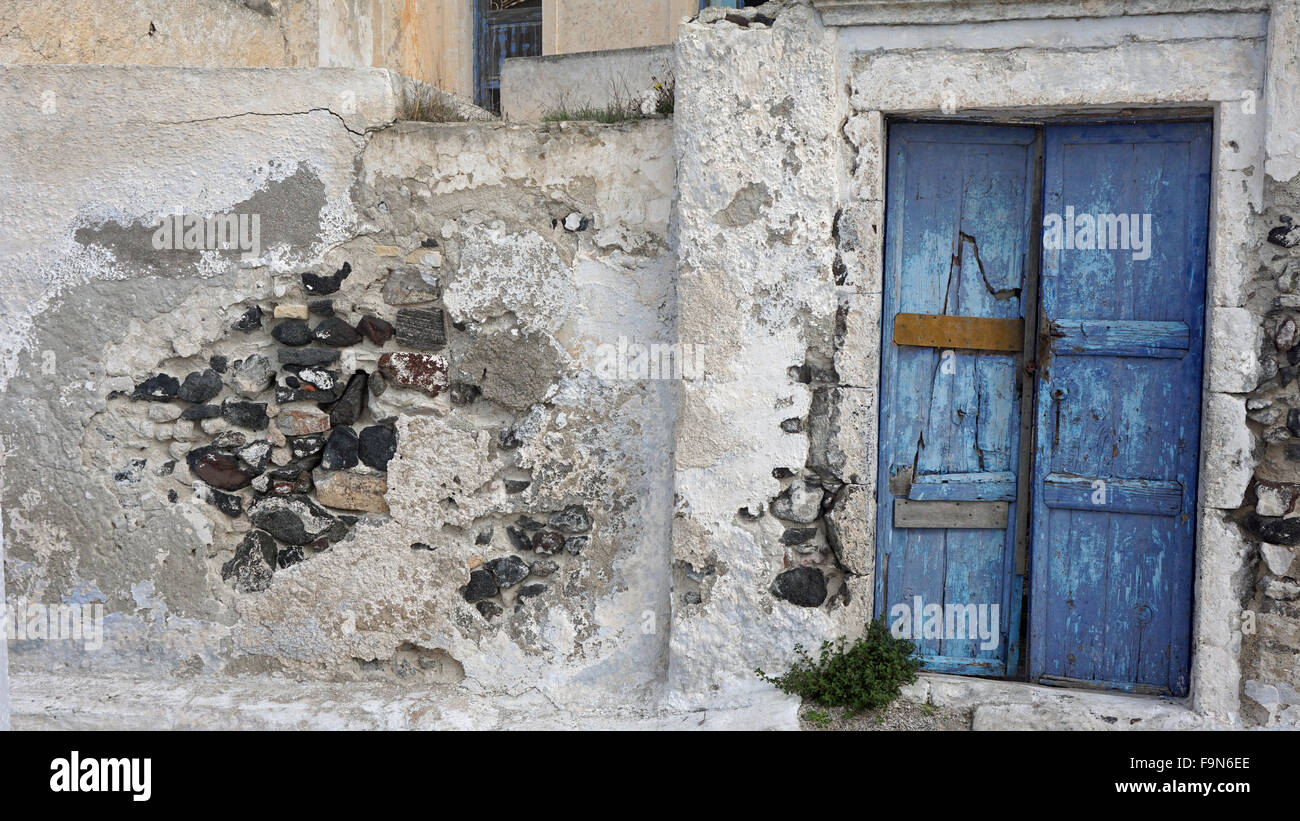 rotten wall and blue door Stock Photo - Alamy