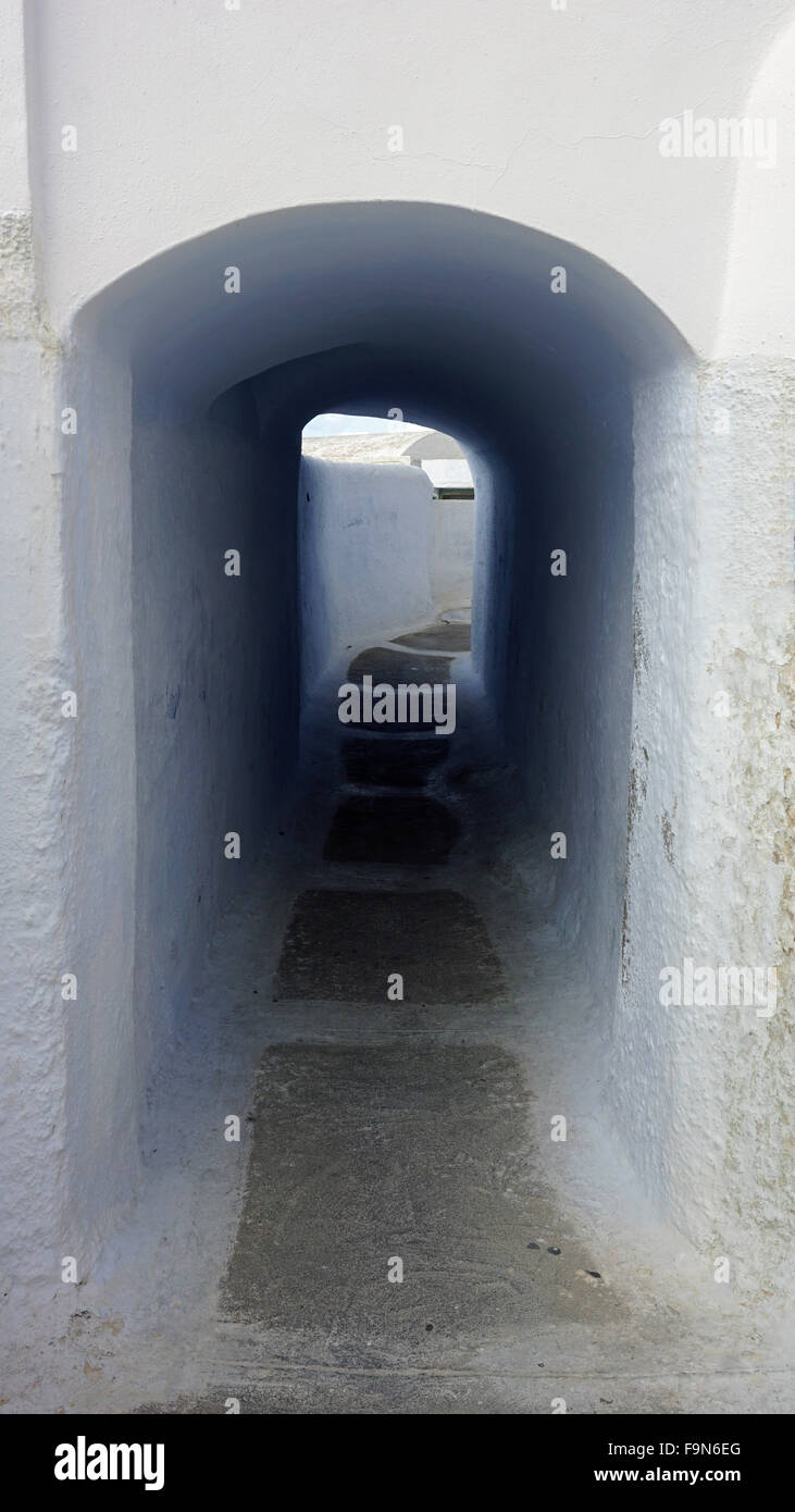 pathway through greece village Stock Photo - Alamy