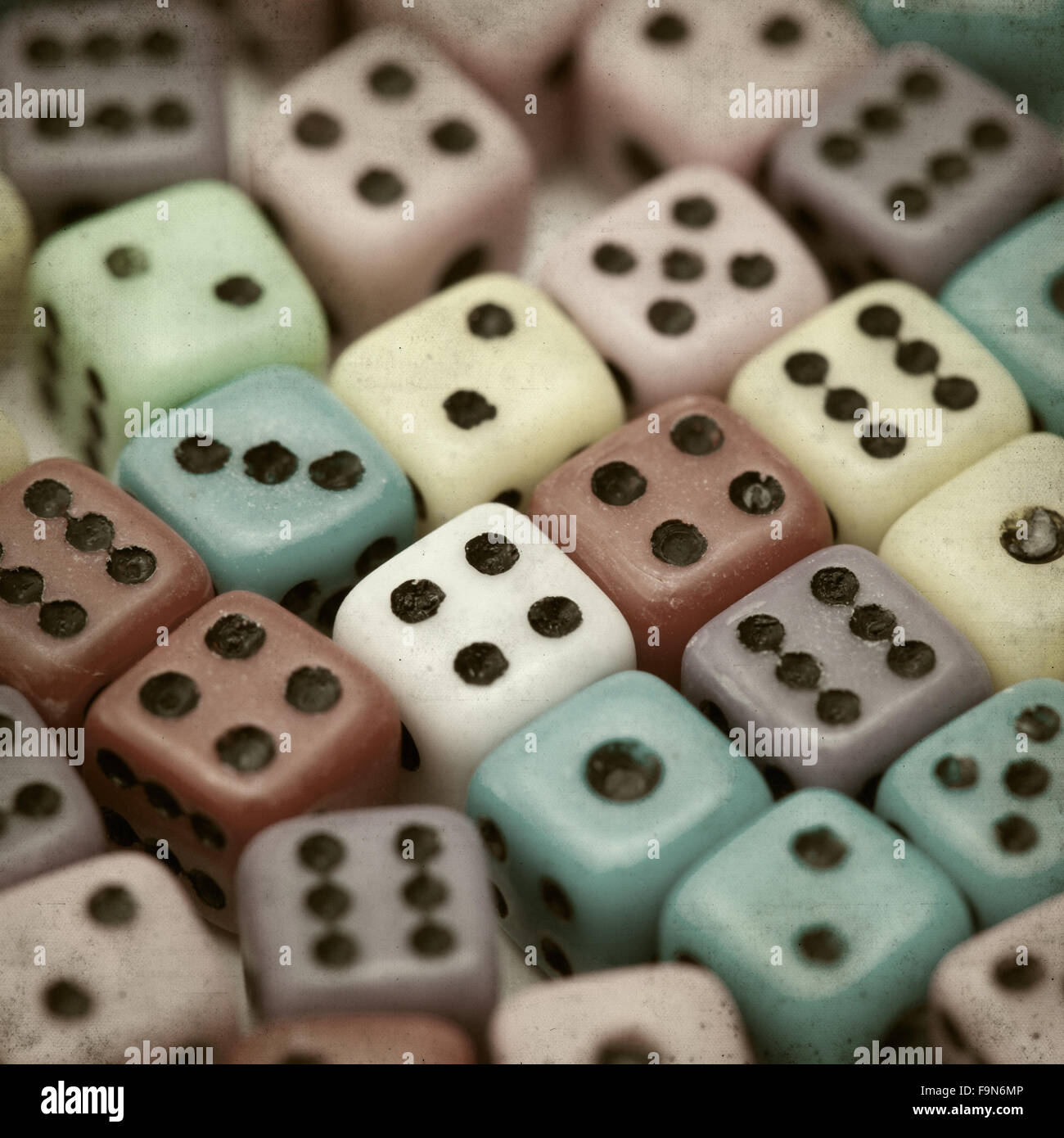 textured old paper background with many small dice Stock Photo - Alamy