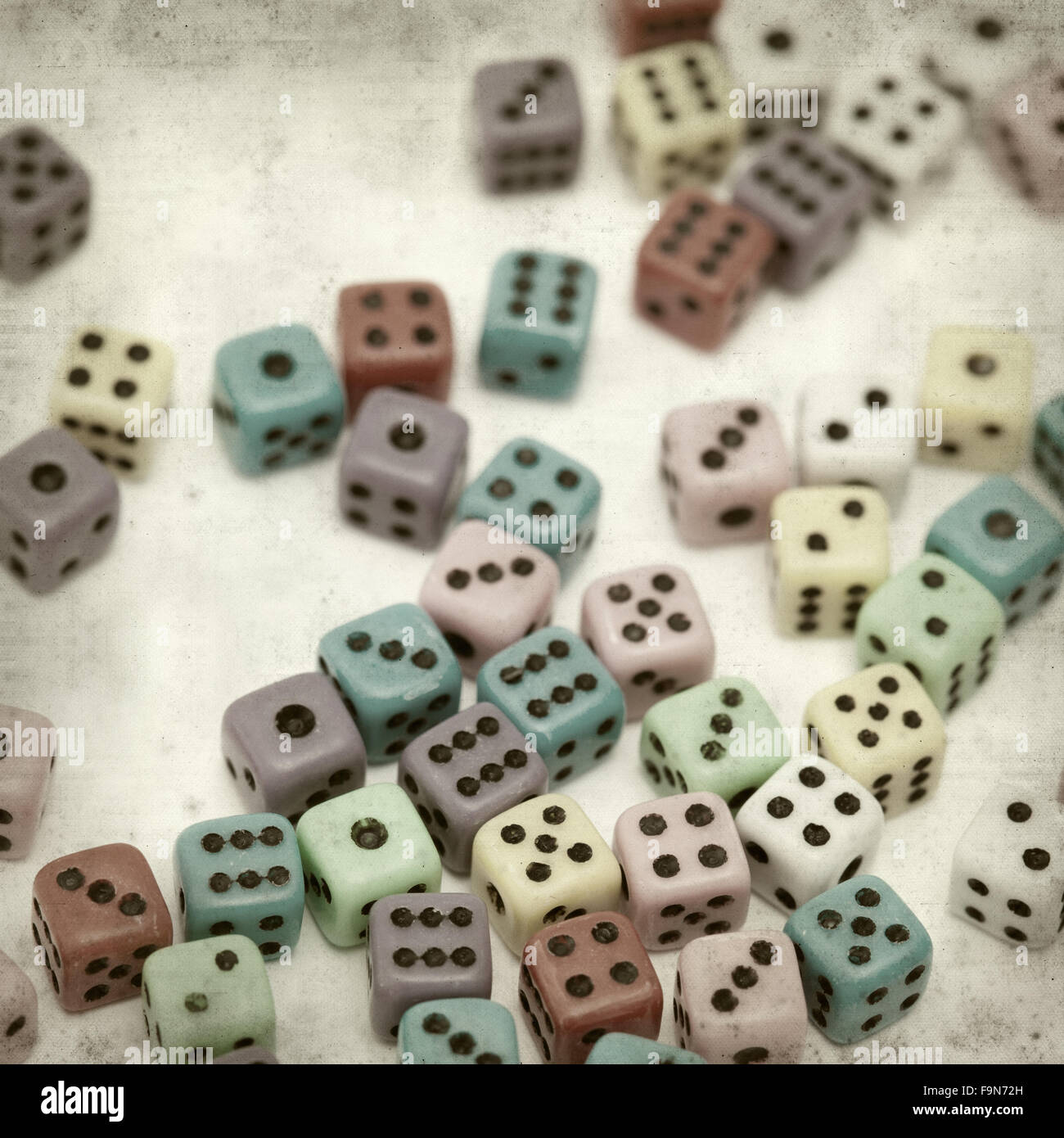 textured old paper background with many small dice Stock Photo - Alamy