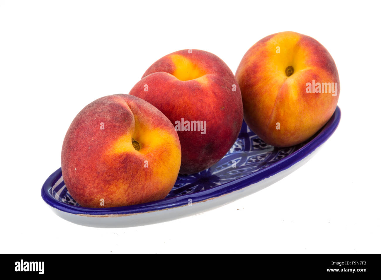 Bright ripe peaches isolated Stock Photo - Alamy
