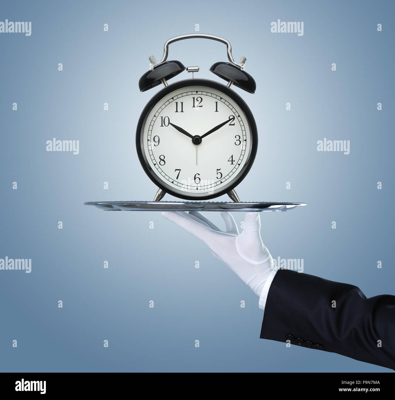 Hand on alarm clock hi-res stock photography and images - Alamy