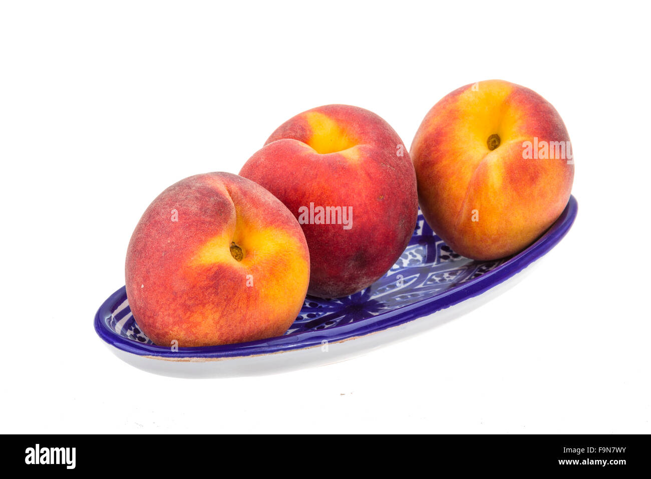 Bright ripe peaches isolated Stock Photo - Alamy