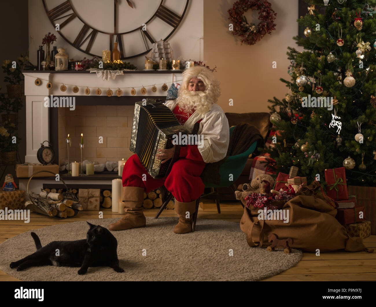 Real santa claus playing hi-res stock photography and images - Alamy