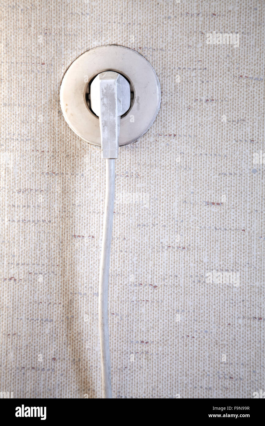 vintage power plug in a socket Stock Photo - Alamy