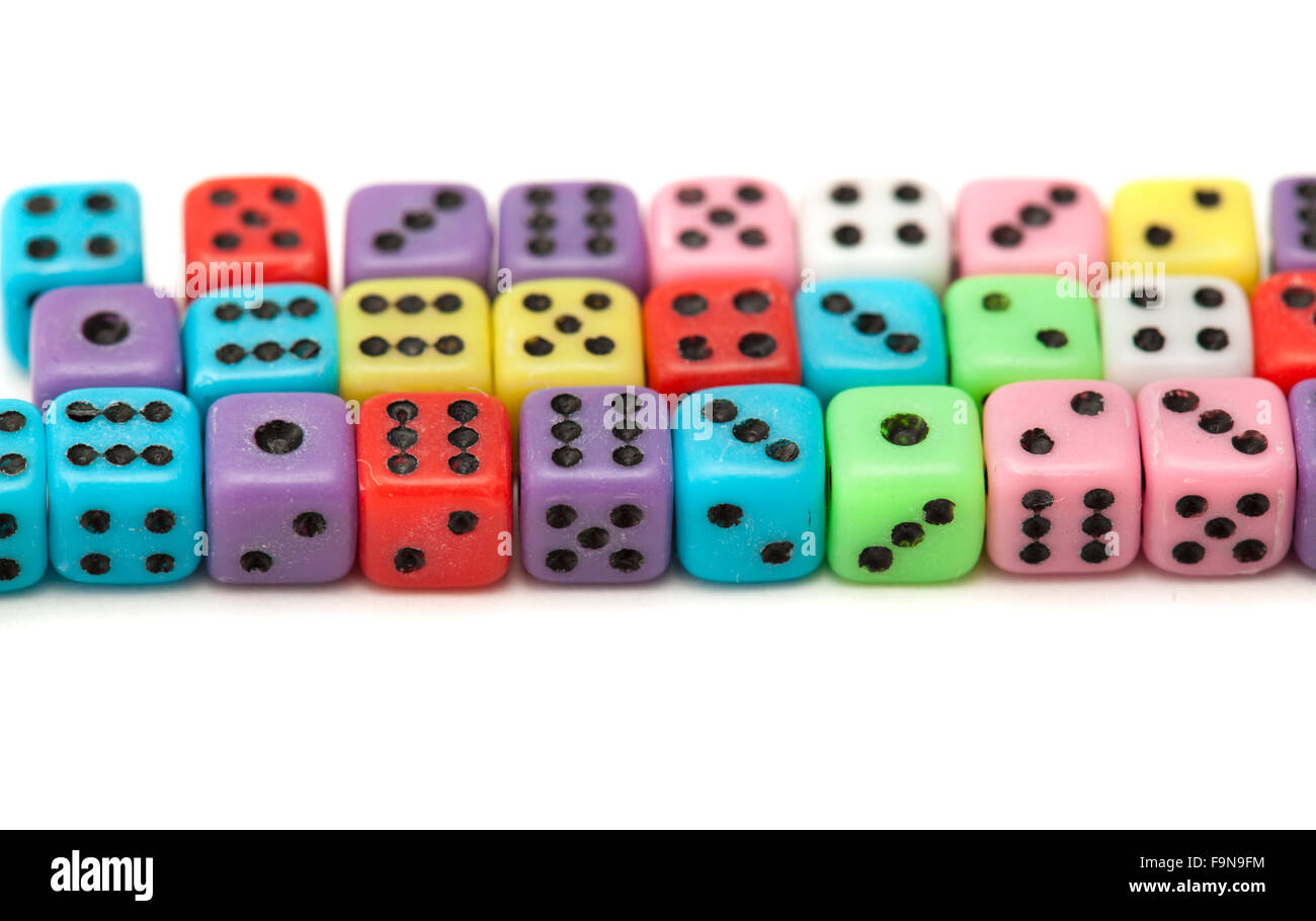 many small colorful plastic dice isolated on white background Stock ...