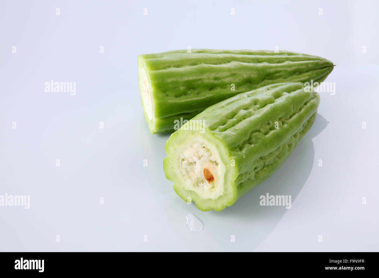 bitter guard on the white background Stock Photo - Alamy