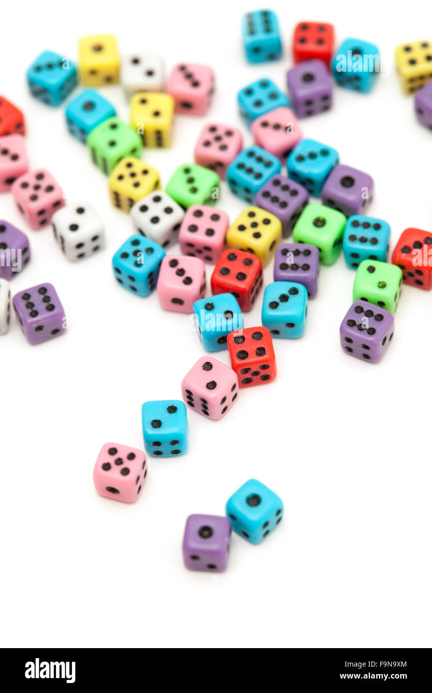 many small colorful plastic dice isolated on white background Stock ...