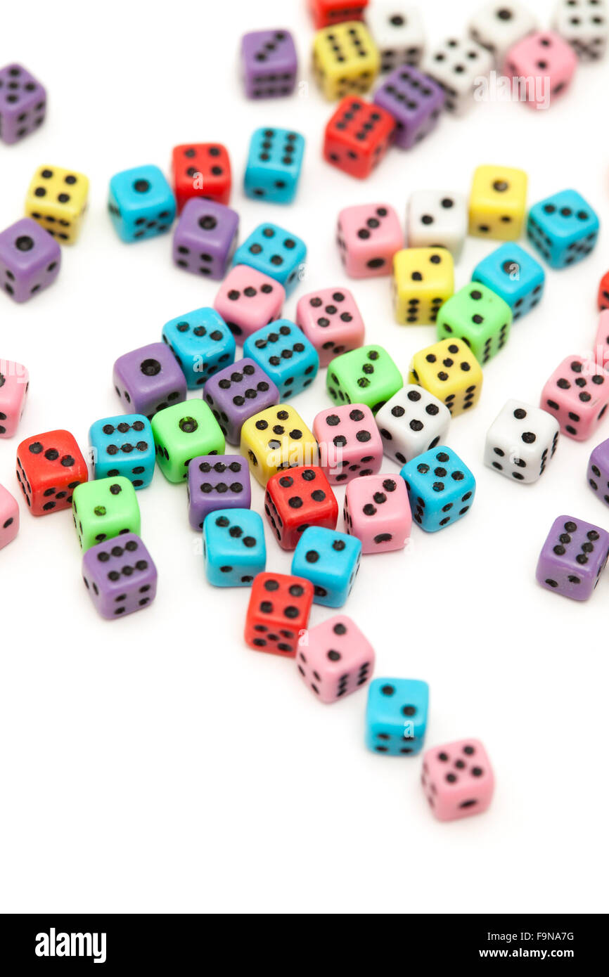 many small colorful plastic dice isolated on white background Stock ...