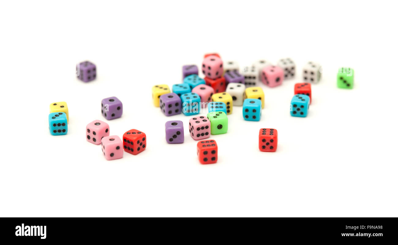 many small colorful plastic dice isolated on white background Stock ...