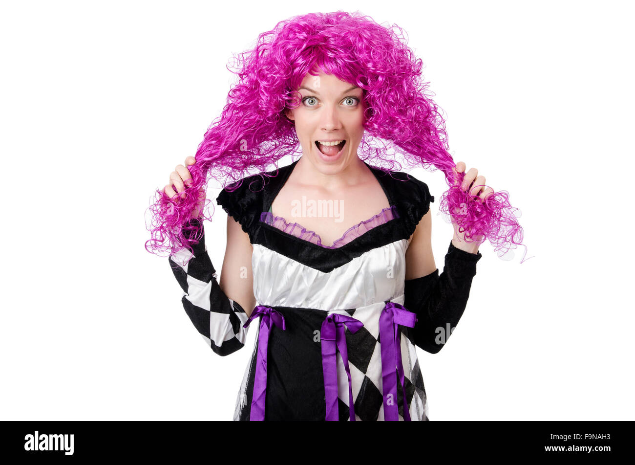 Pretty girl in jester costume isolated on white Stock Photo - Alamy