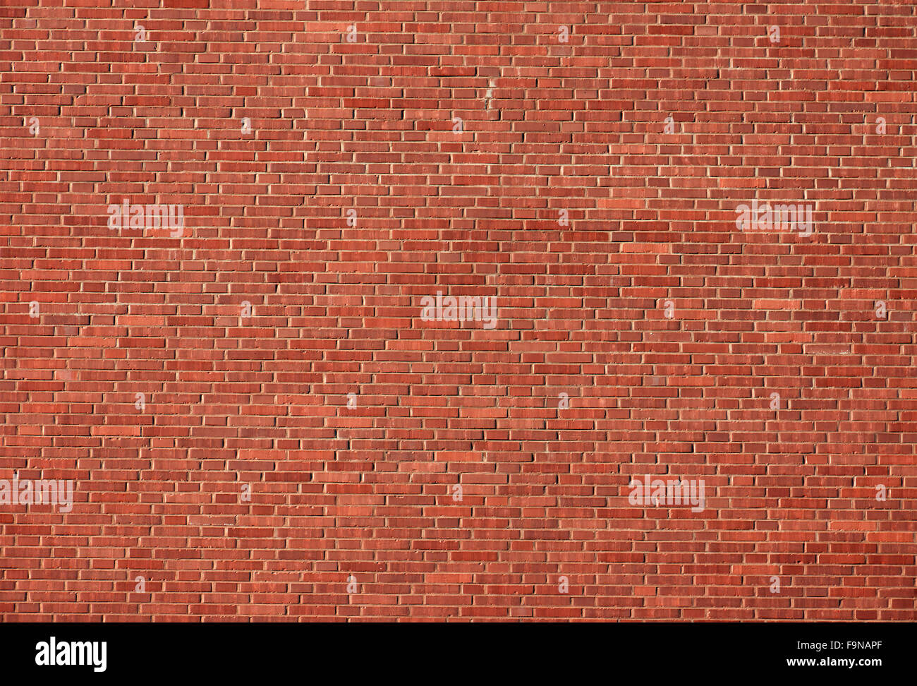 Beautiful background of a fine red brickwall Stock Photo - Alamy