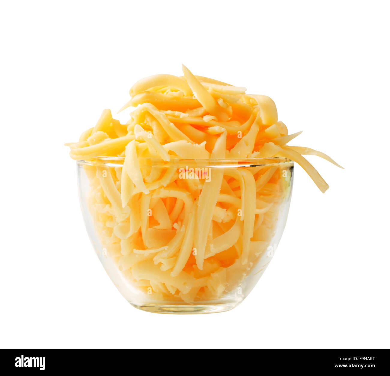 Grated yellow cheese in a glass cup Stock Photo - Alamy