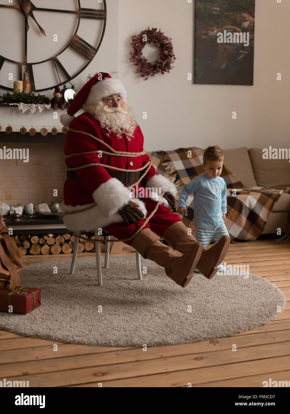 Santa Claus Playing at Home with Child Stock Photo - Alamy