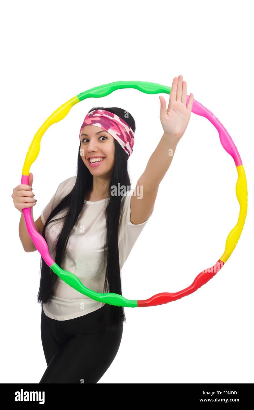 A girl in sport suit with hula hoop isolated on white Stock Photo - Alamy