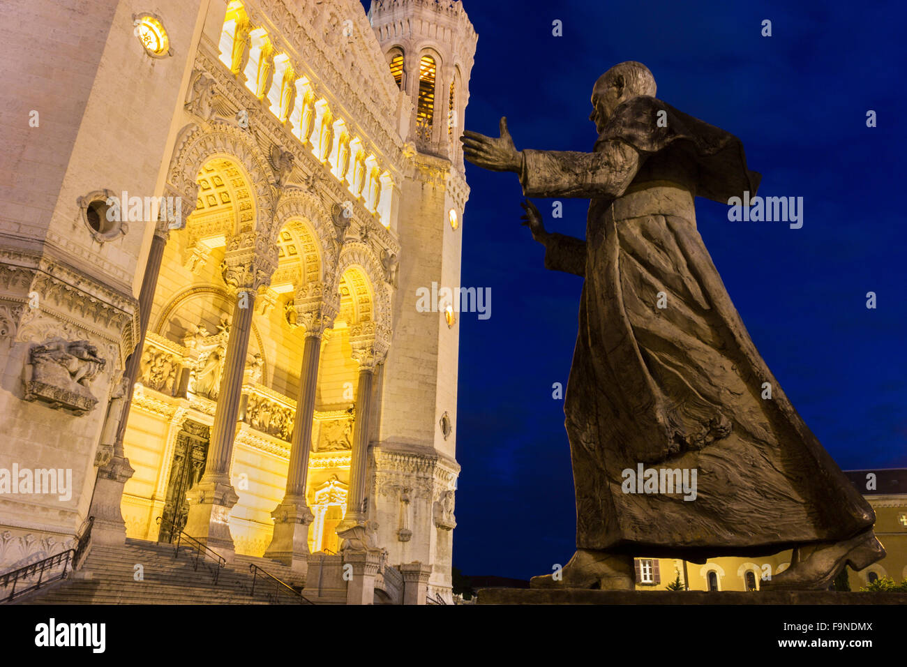 Basilica of Notre-Dame and Pope John Paul II statue in Lyon, France ...