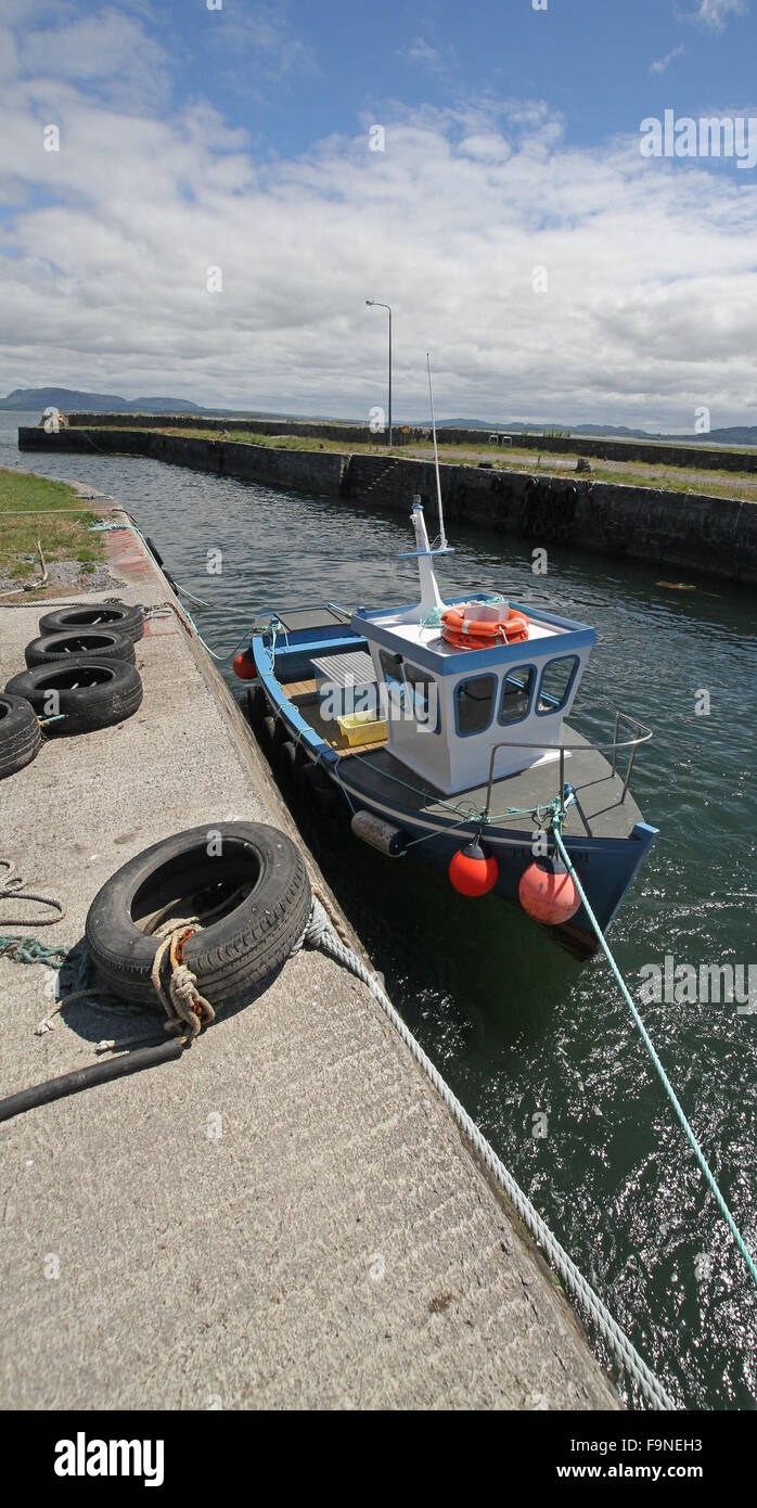 Small inshore fishing boat moored in Raghly Harbour in County Sligo ...
