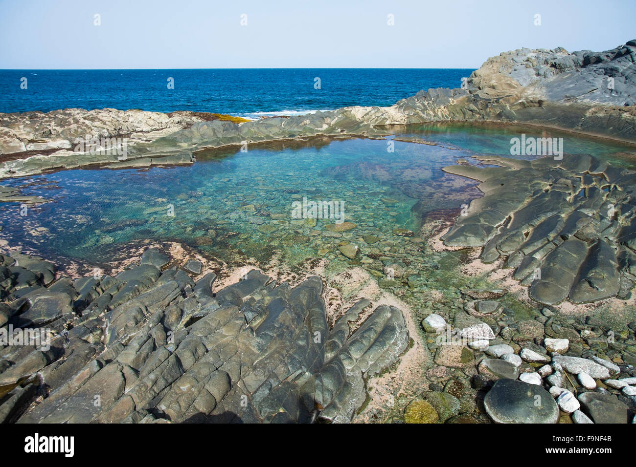 Gran Canaria, Banaderos area, calm rock pools, ocean at low tide Stock ...
