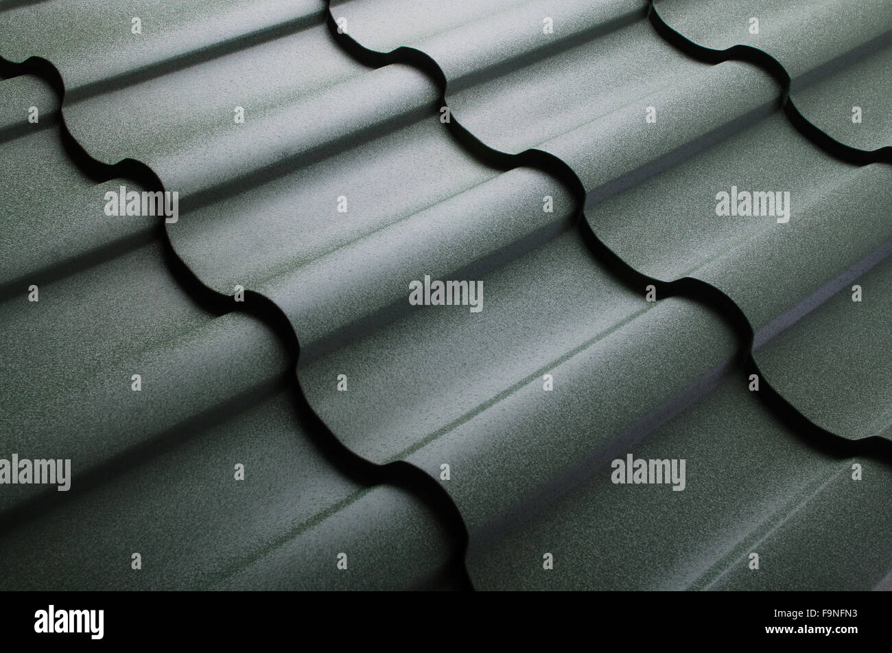 Close up of metal roof tile Stock Photo - Alamy