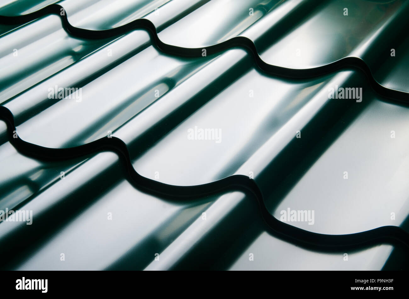 Close up of metal roof tile Stock Photo - Alamy